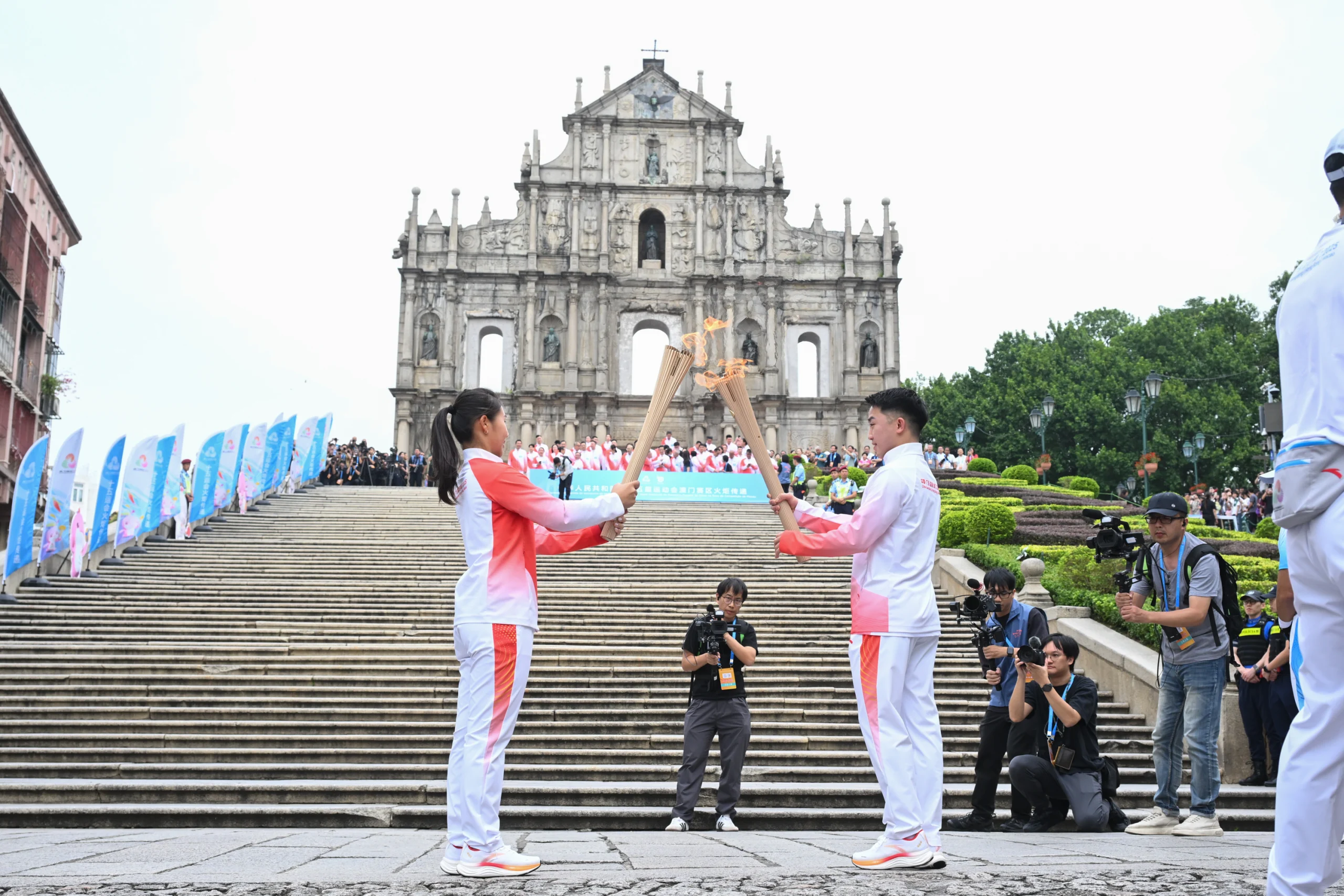 First-ever cross-boundary torch relay held for National Games