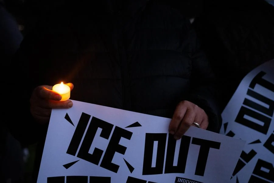 White House seeks to ease tensions after shooting in Minnesota